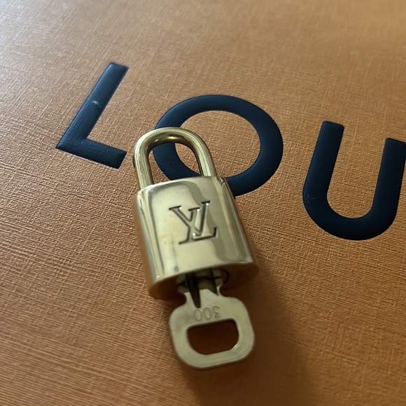 Louis Vuitton | Accessories | Authentic Louis Vuitton Lock 30 | Poshmark